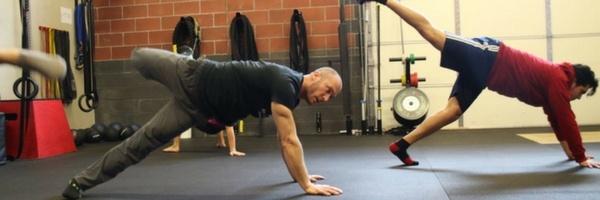 Coach vs. Trainer | Empowered Strength